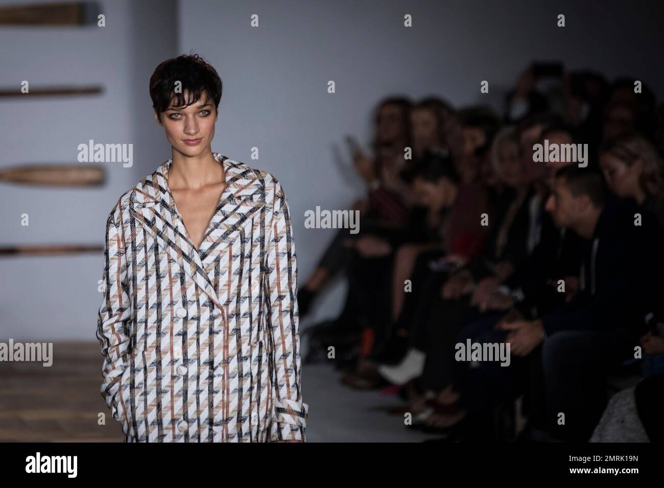 A model wears a creation by designer DAKS during their Spring/Summer ...