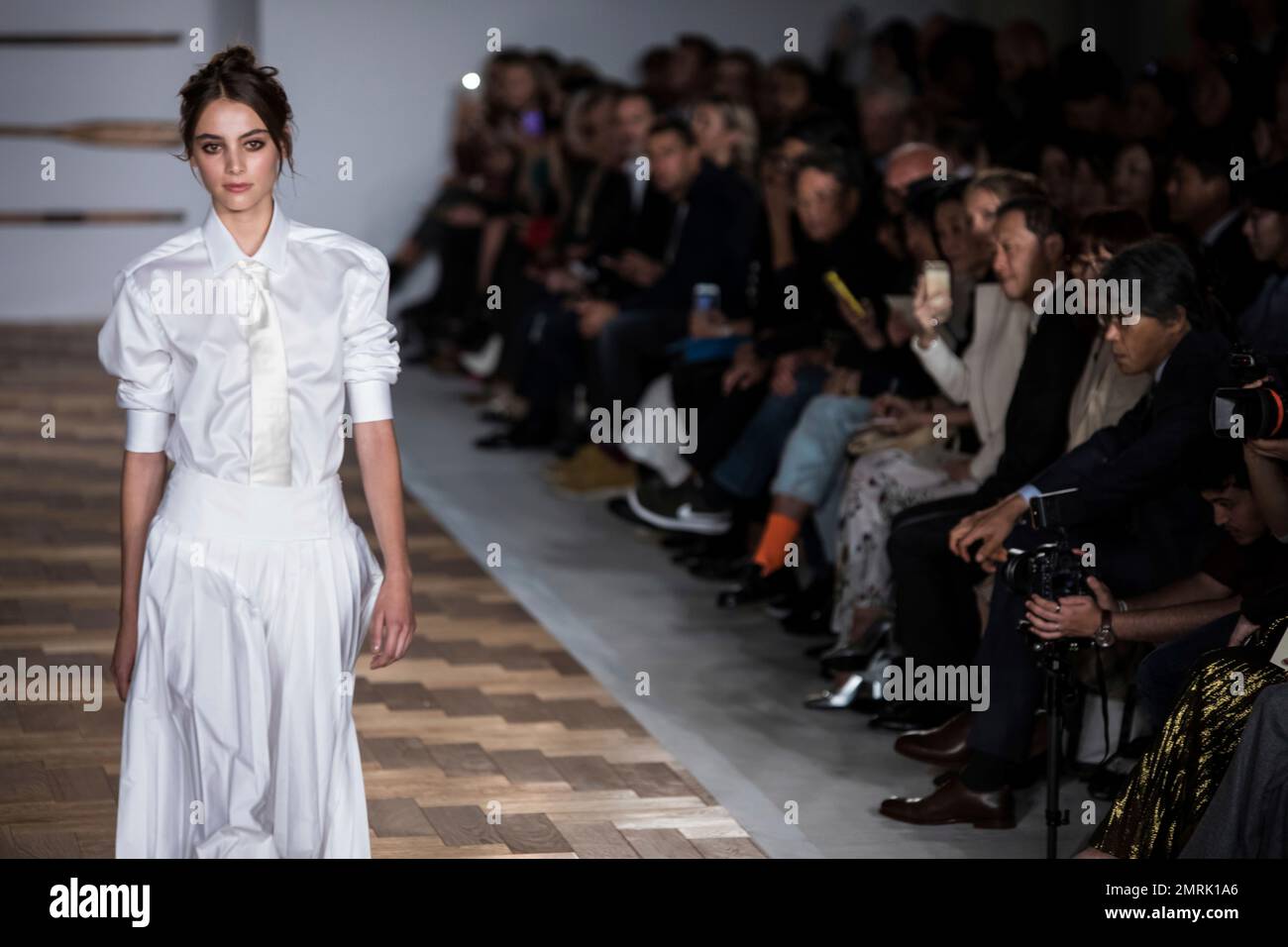 A model wears a creation by designer DAKS during their Spring/Summer ...