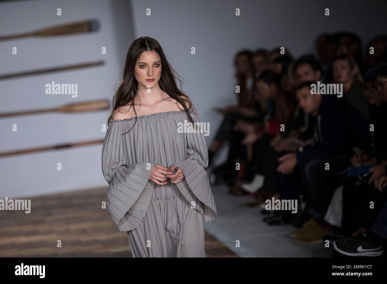 A model wears a creation by designer DAKS during their Spring/Summer ...