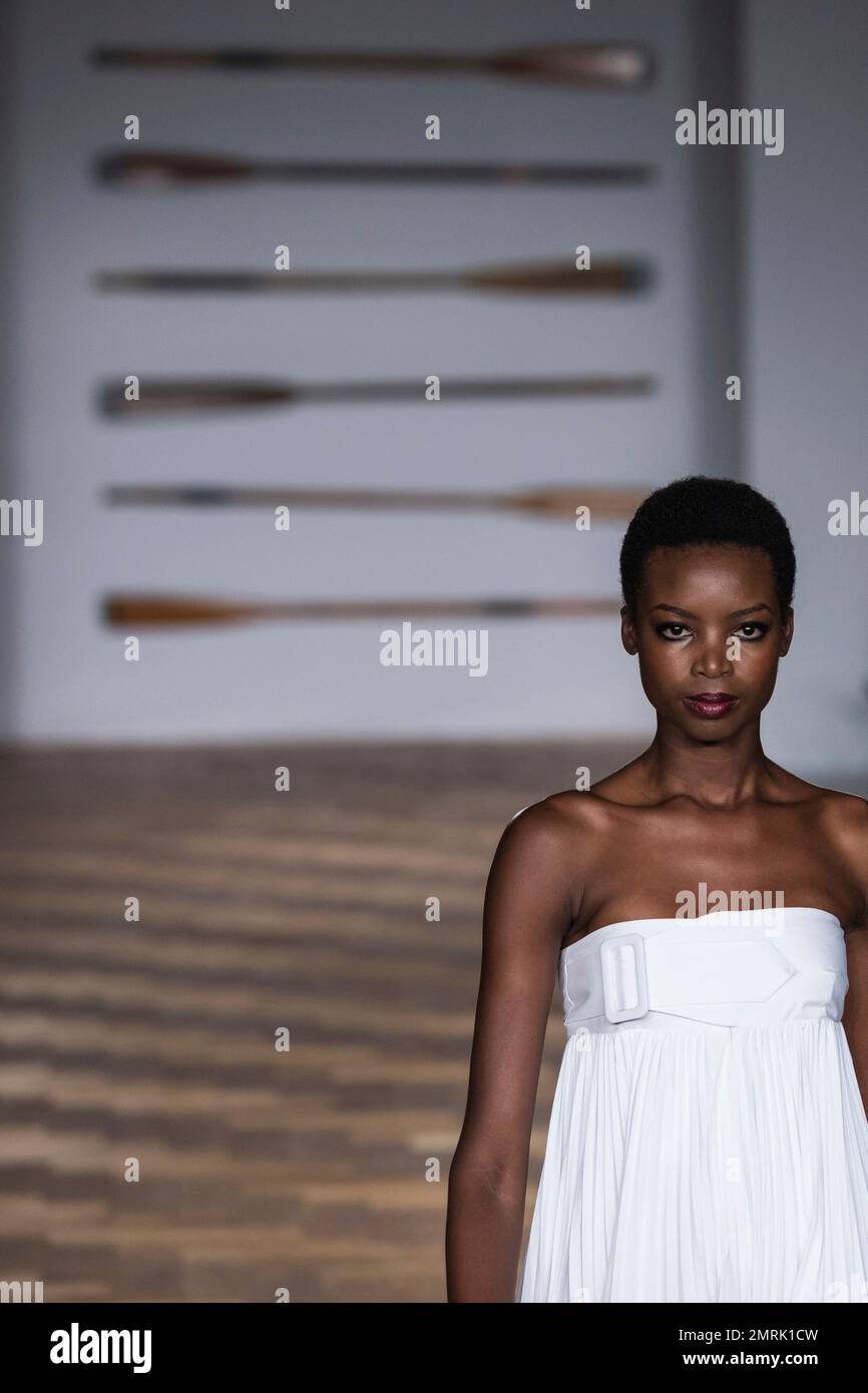 A model wears a creation by designer DAKS during their Spring/Summer ...