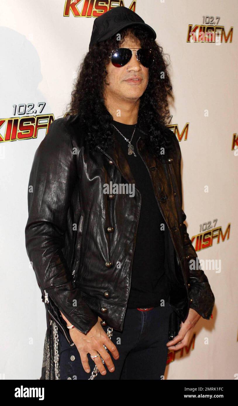 Slash poses on the red carpet during the KISS FM Jingle Ball 2010 held ...