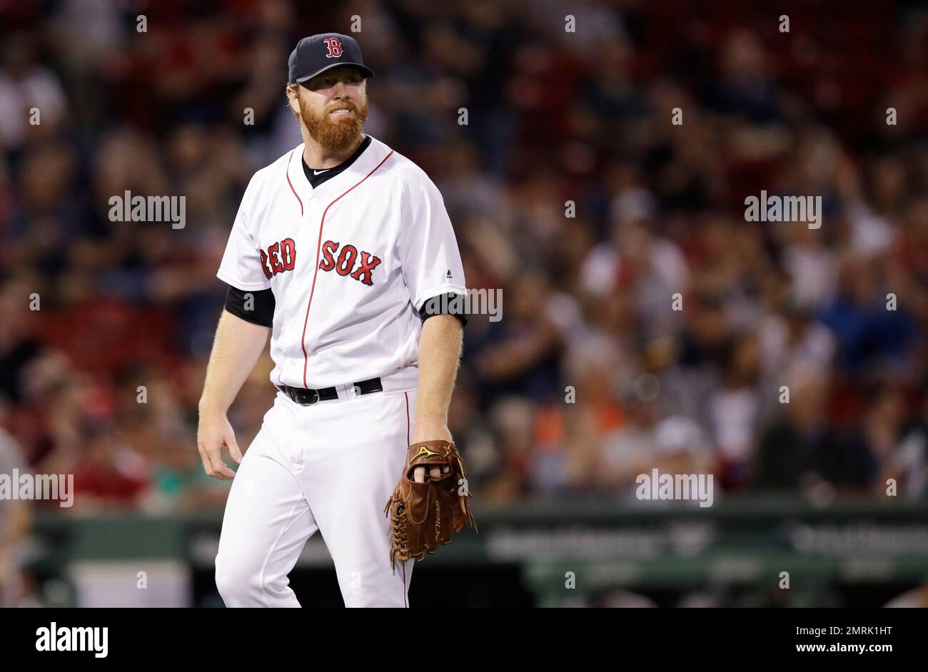 Boston Red Sox relief pitcher Blaine Boyer heads to the dugout during a ...