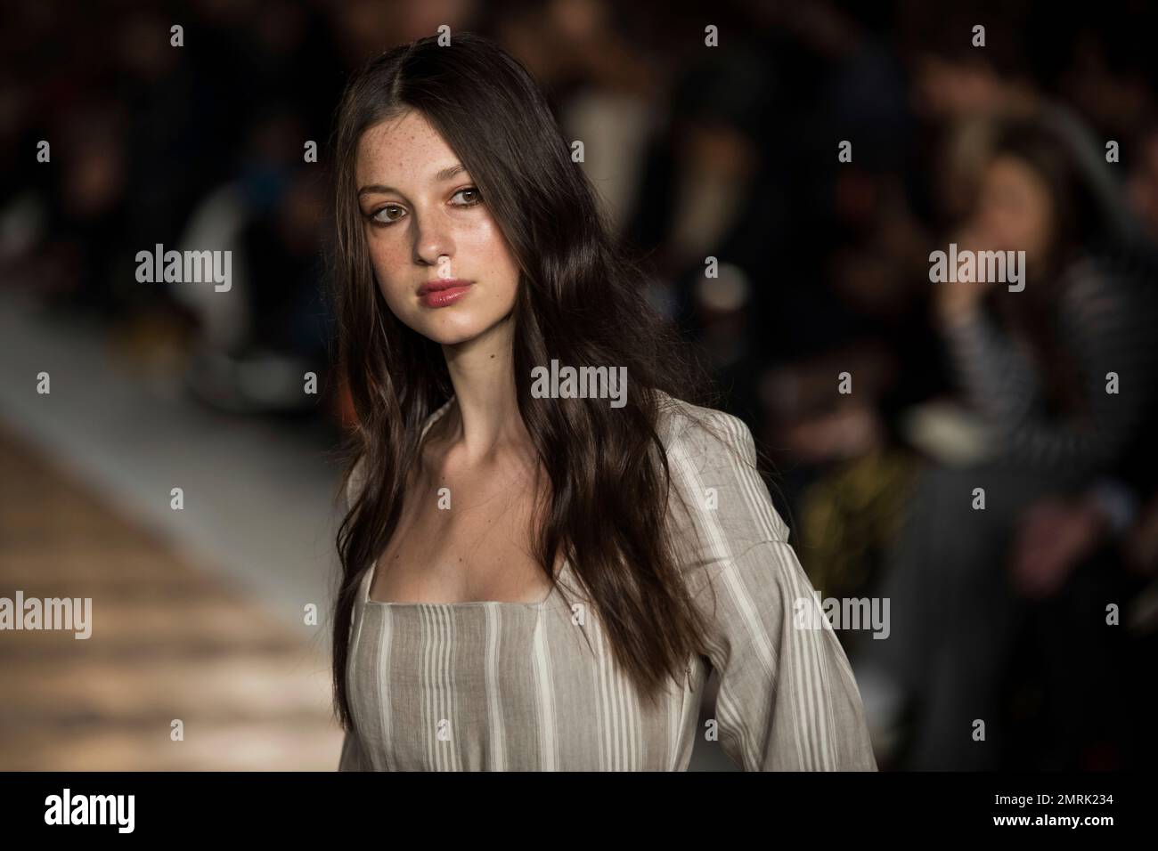 A model wears a creation by designer DAKS during their Spring/Summer ...