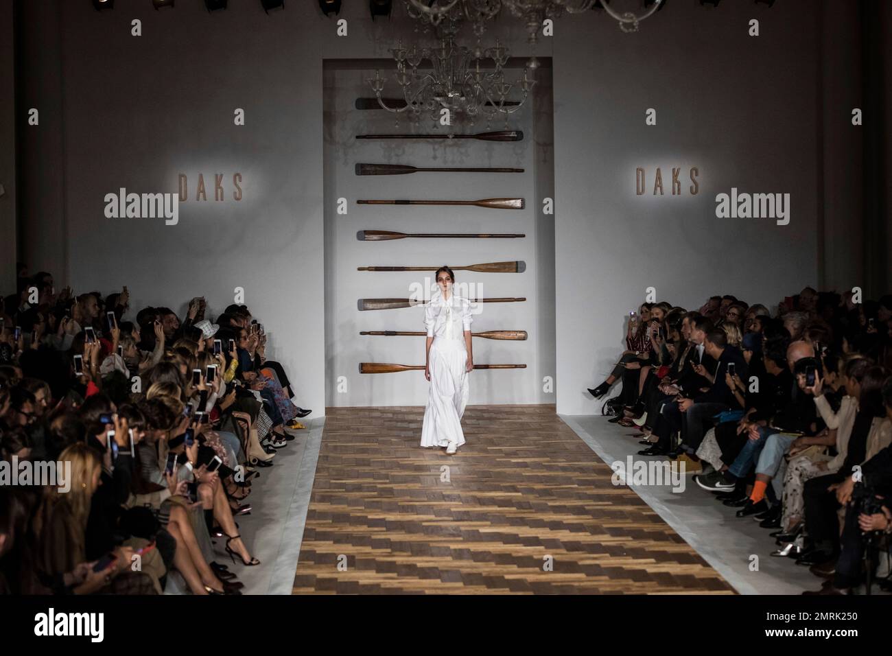 A model wears a creation by designer DAKS during their Spring/Summer ...
