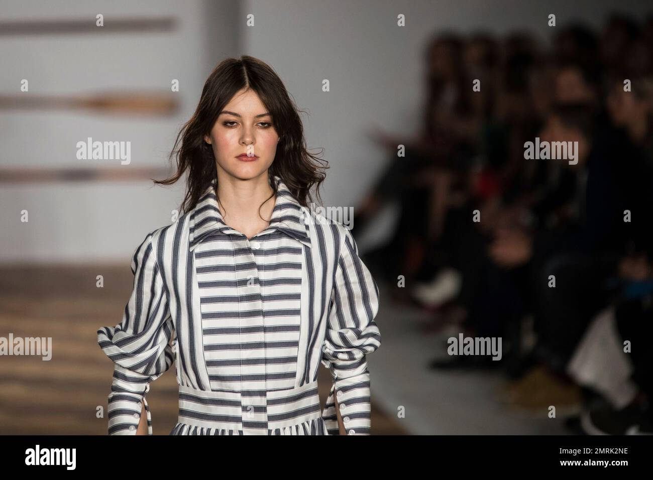 A model wears a creation by designer DAKS during their Spring/Summer ...