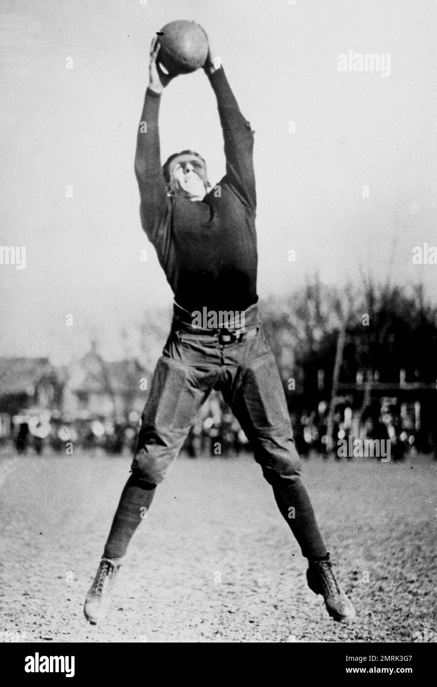 H.E. "Red" Grange, the champion forward pass interceptor of the ...