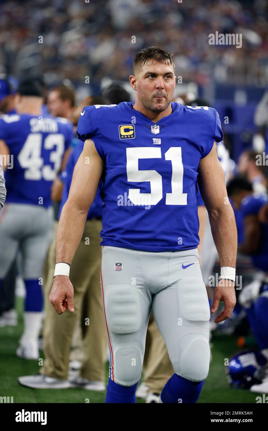 New York Giants long snapper Zak DeOssie (51) walks along the sideline ...
