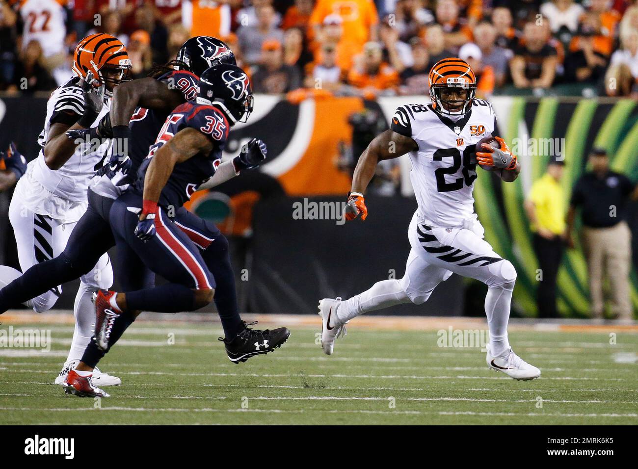 Cincinnati Bengals running back Joe Mixon (28) runs the ball in the ...
