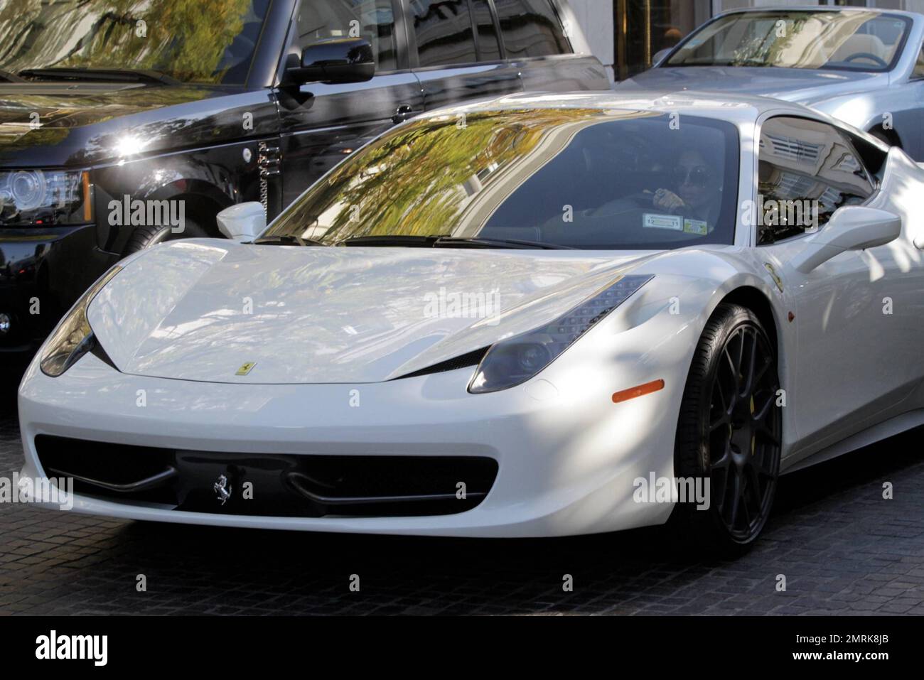 Looking stunning and sophisticated in an all-black outfit, Kim ...