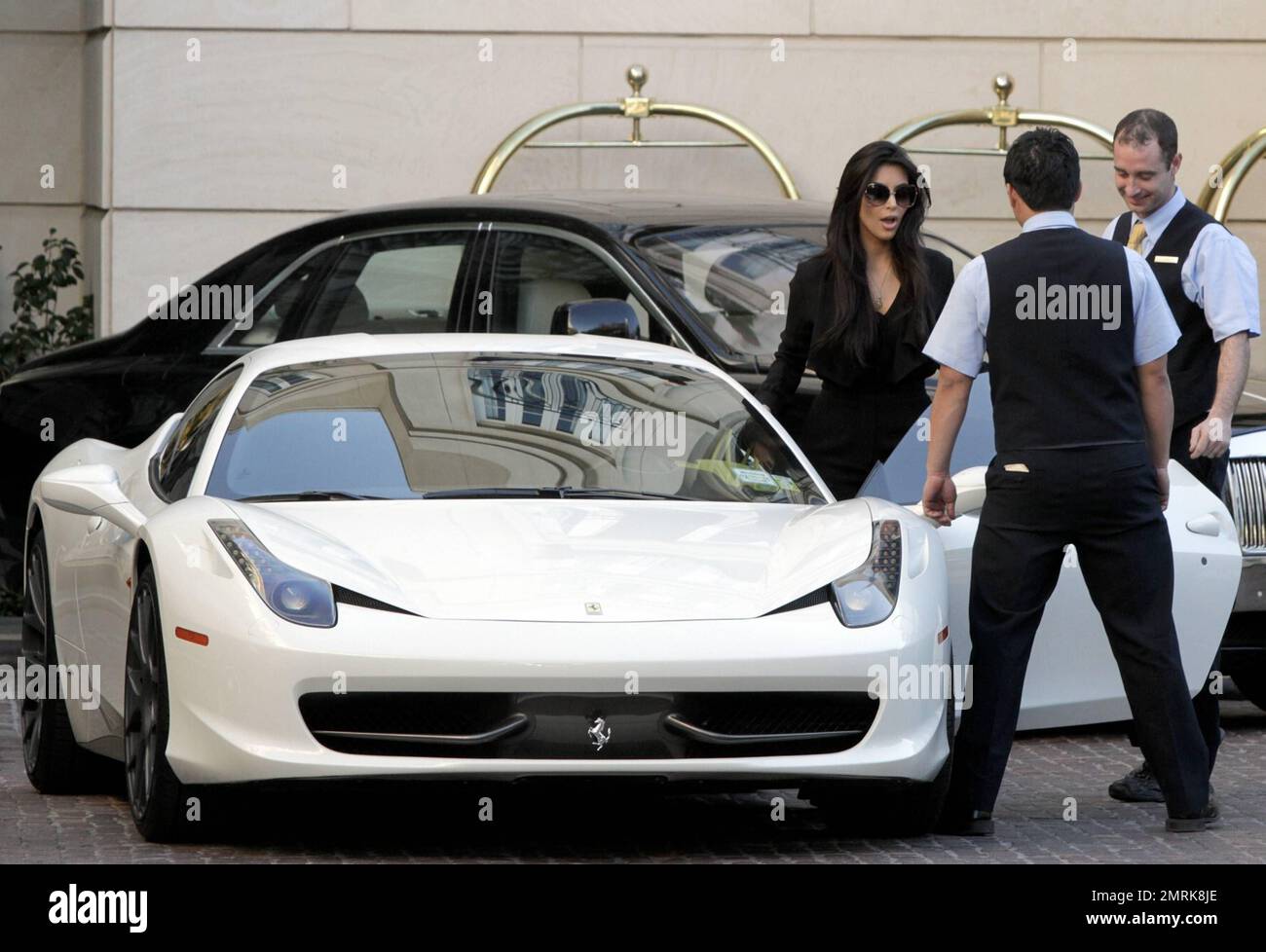Looking stunning and sophisticated in an all-black outfit, Kim ...