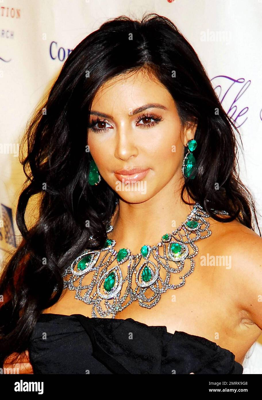 Looking gorgeous in a black gown paired with a stunning necklace, Kim ...