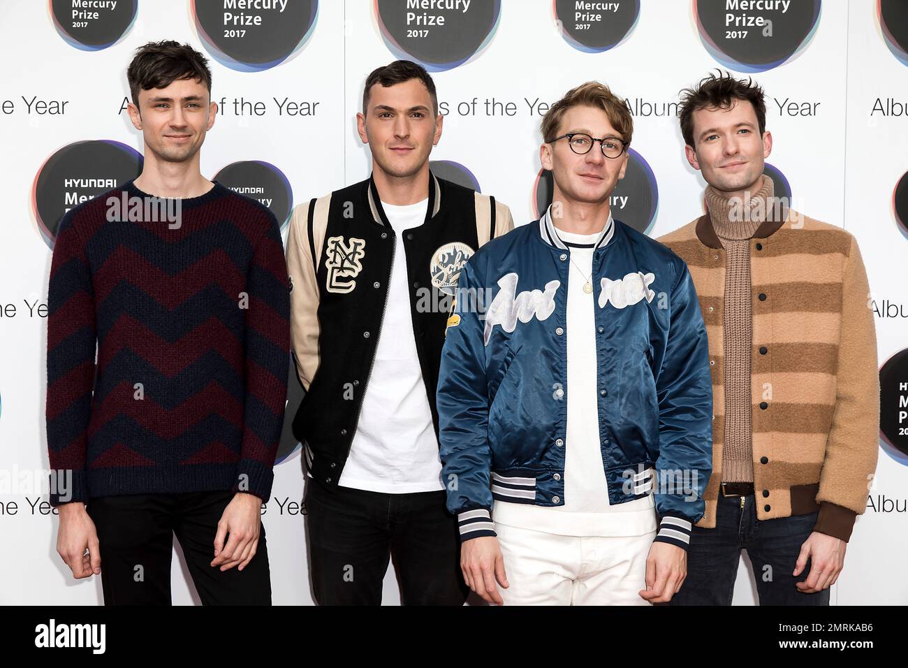 Members of the group 'Glass Animals' pose for photographers on arrival ...