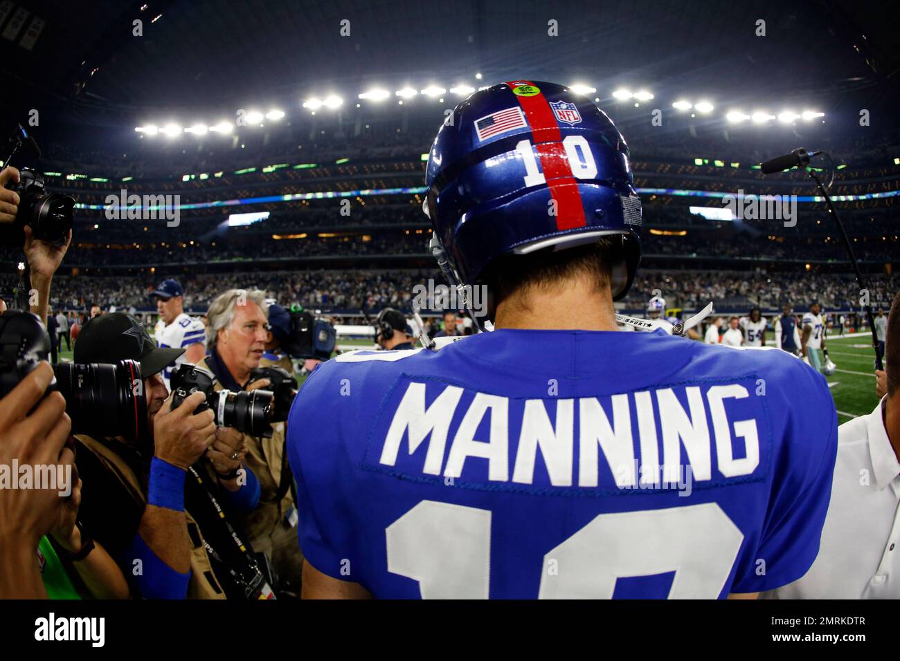 New York Giants' Eli Manning (10) walks off the field after an NFL ...