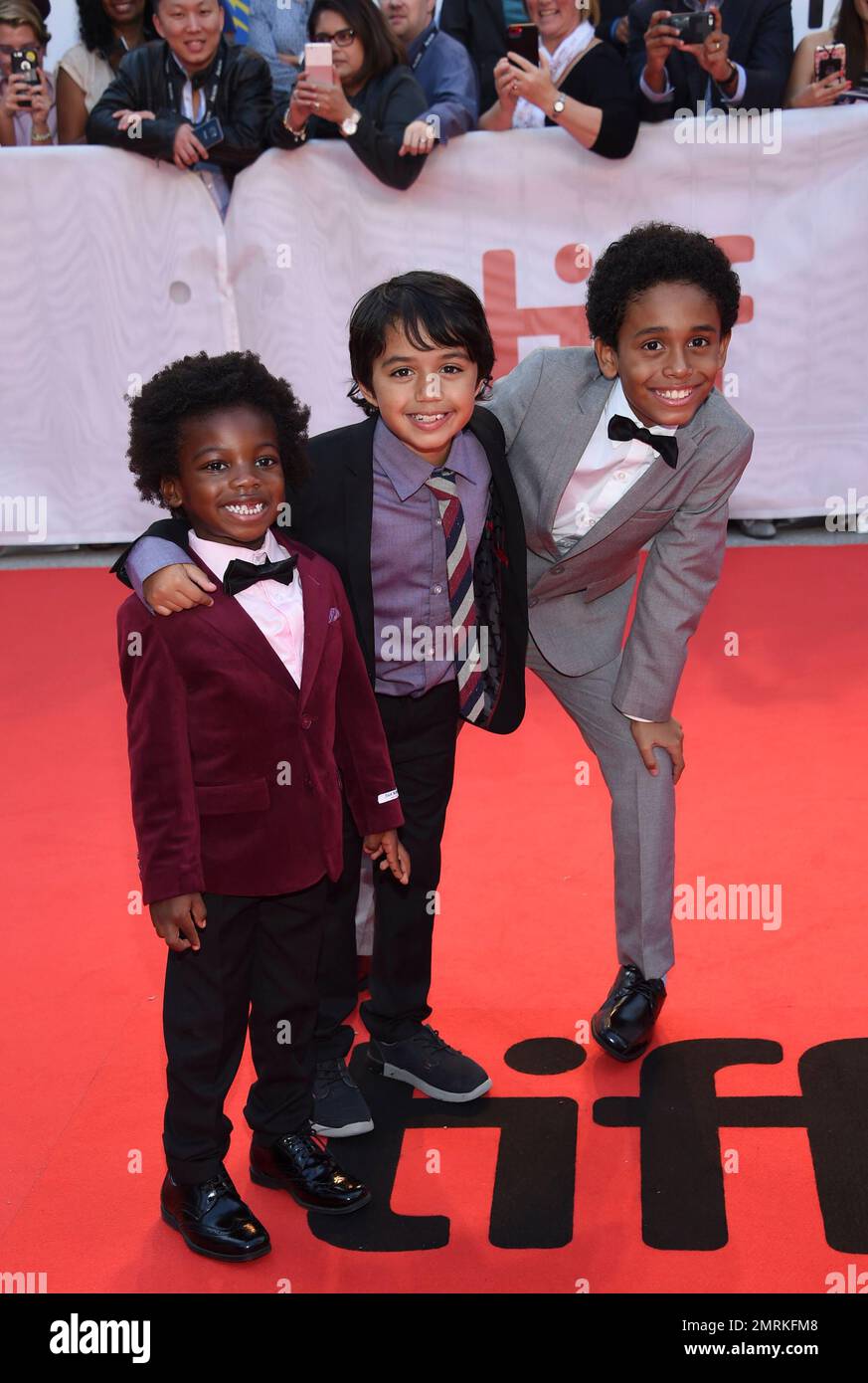 Actors Aiden Akpan, left, Callan Farris and Reece Cody attend the ...