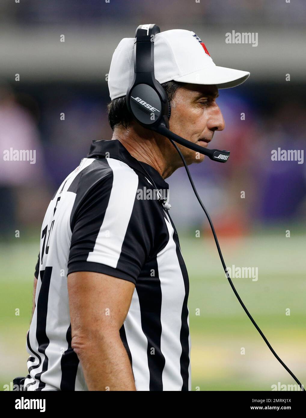 Referee Gene Steratore checks on a replay during the first half of an ...