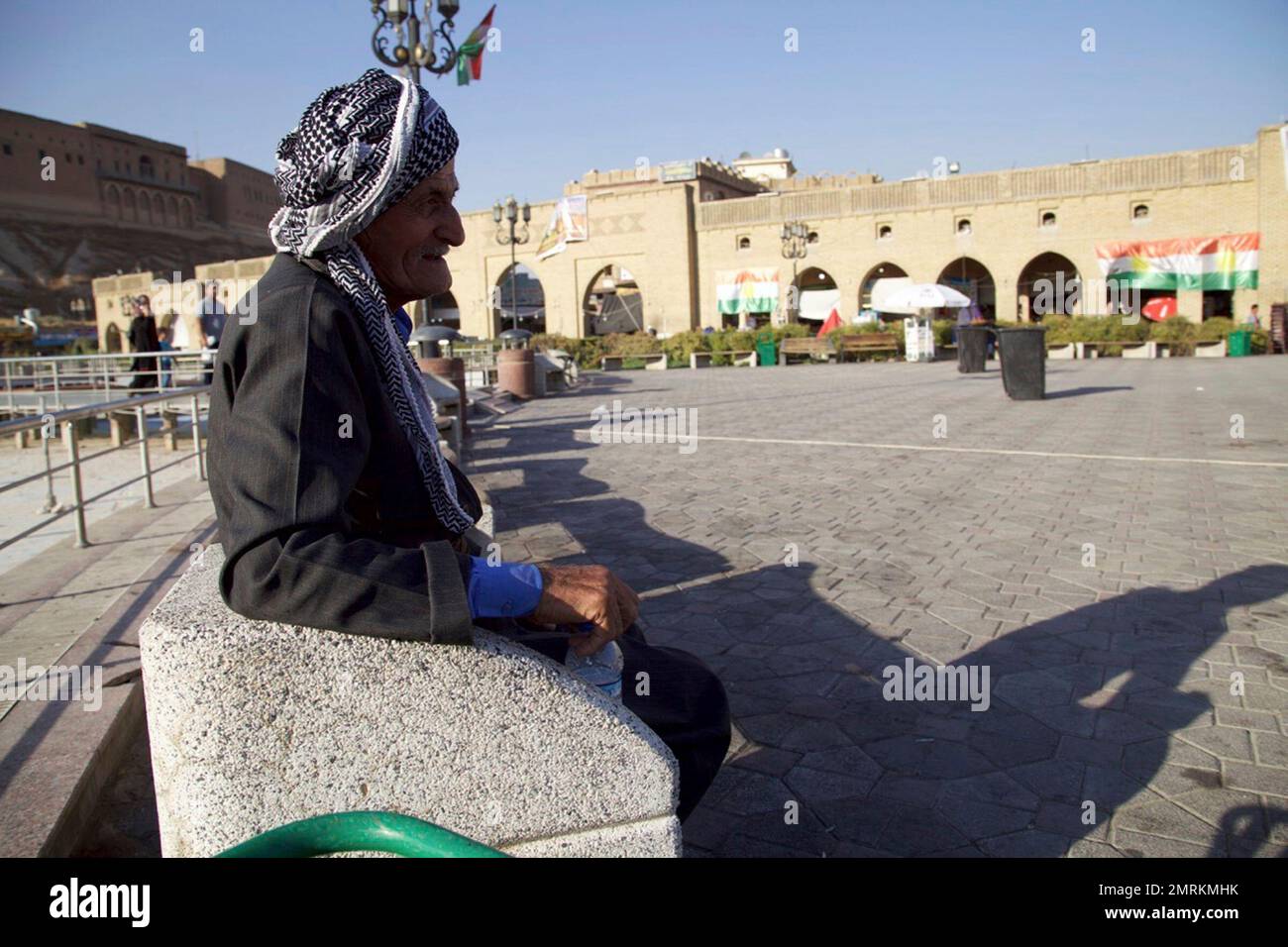 In this Thursday, Aug. 24, 2017 photo, Saber Salim sits in the center ...