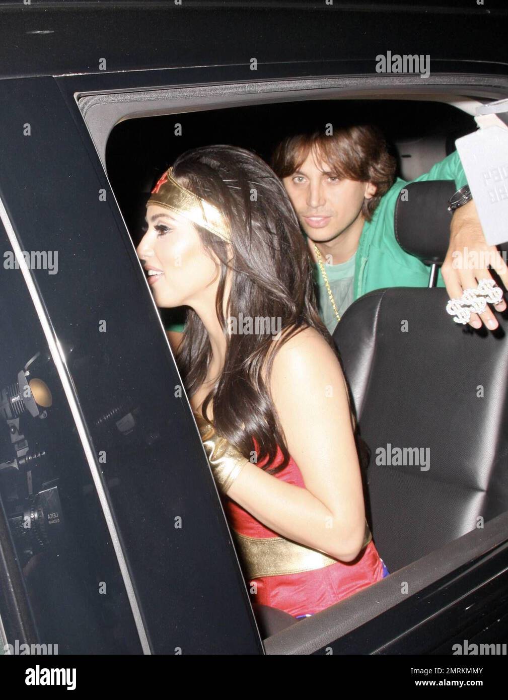 Kim Kardashian arrives dressed as Wonder Woman at the BlackBerry launch ...