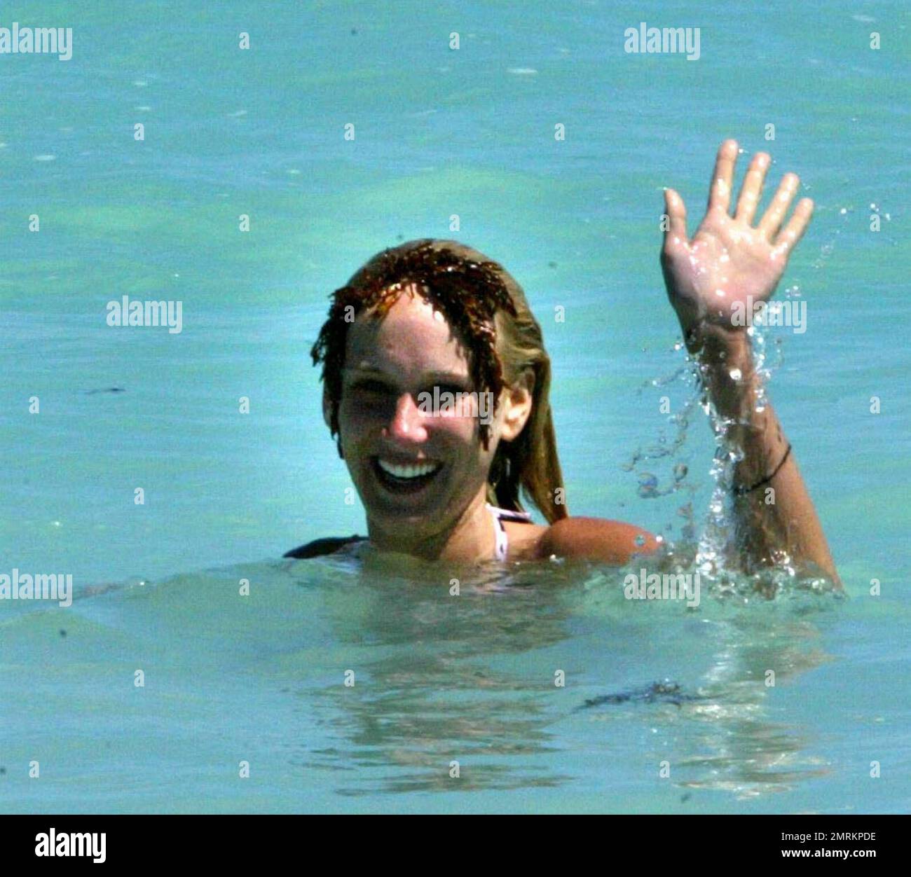 Exclusive!! Kim Stewart and fiancee Cisco Adler fool around in the surf ...