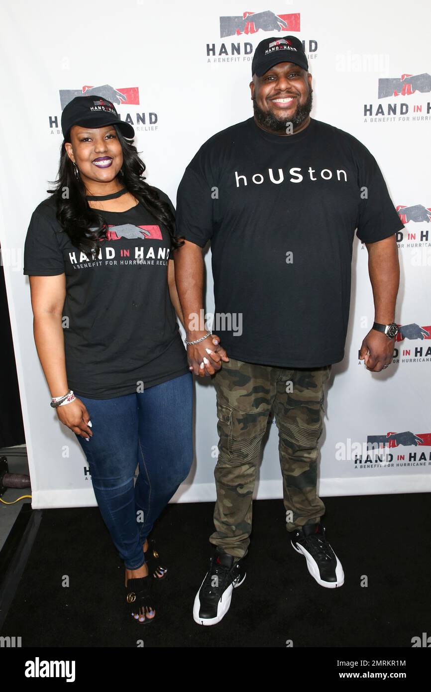 Pastor John Gray, left, and wife Aventer Gray attend the Hand in Hand ...