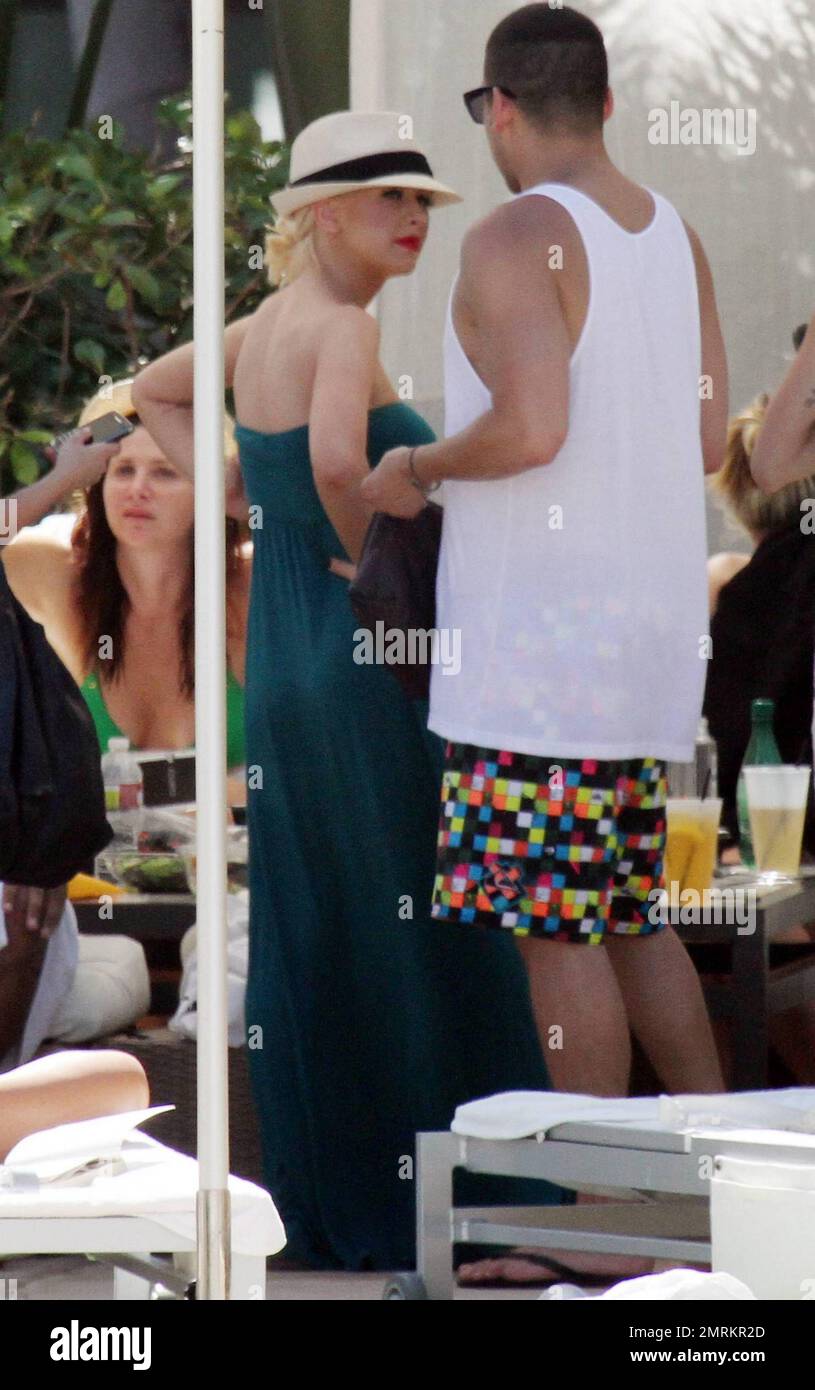 Christina Aguilera joins good pal Simone Harouche poolside at the ...