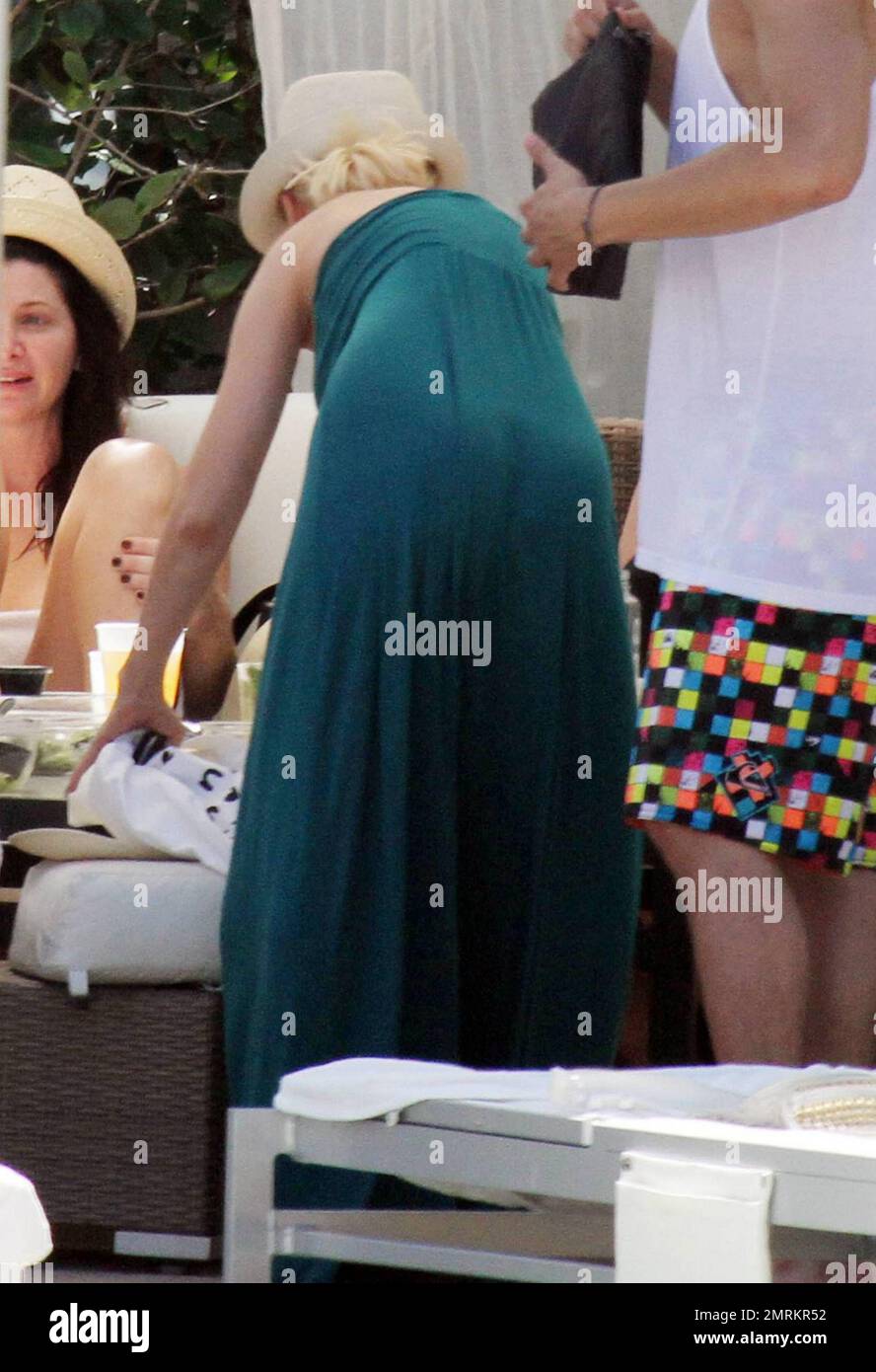 Christina Aguilera joins good pal Simone Harouche poolside at the ...