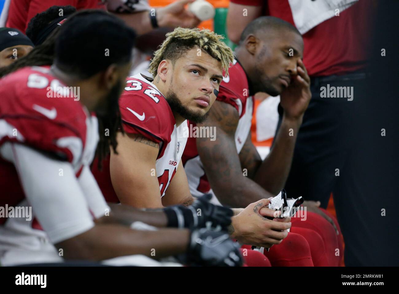 Arizona Cardinals free safety Tyrann Mathieu (32) sits with teammates ...