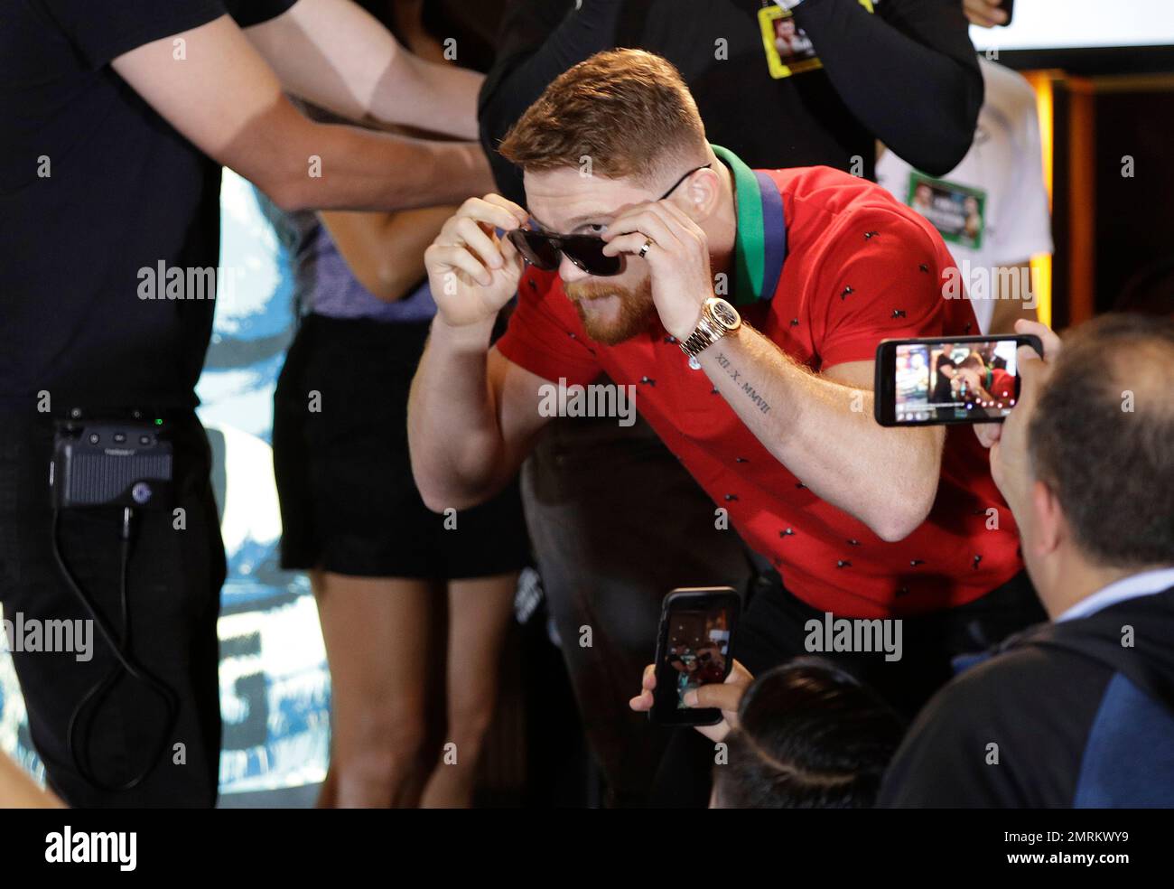 Canelo Alvarez walks on stage on stage during an event Tuesday, Sept ...