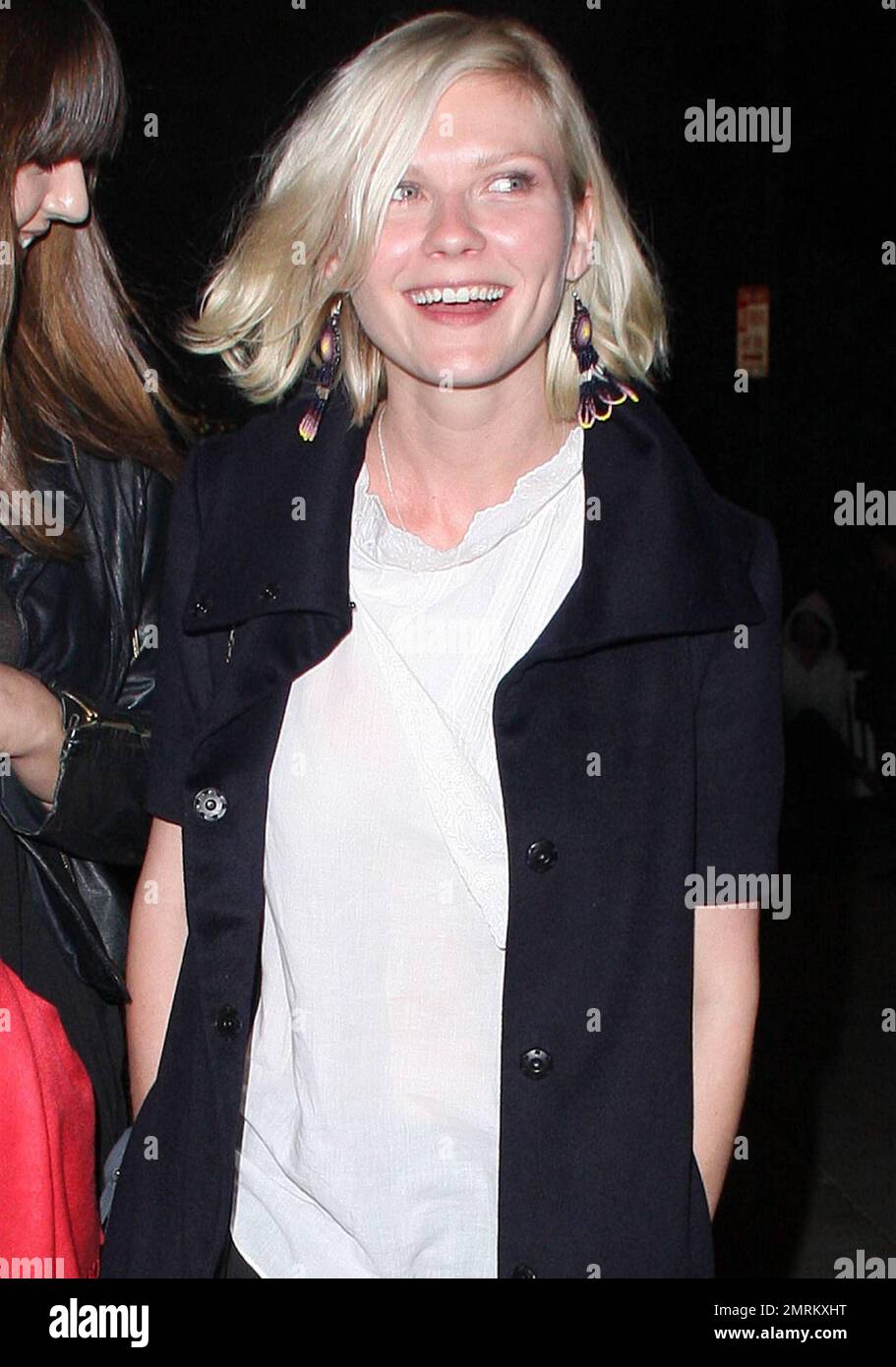 Actress Kirsten Dunst and boyfriend, Rilo Kiley drummer Jason Boesel ...