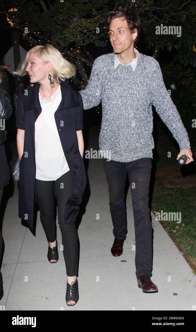 Actress Kirsten Dunst and boyfriend, Rilo Kiley drummer Jason Boesel ...