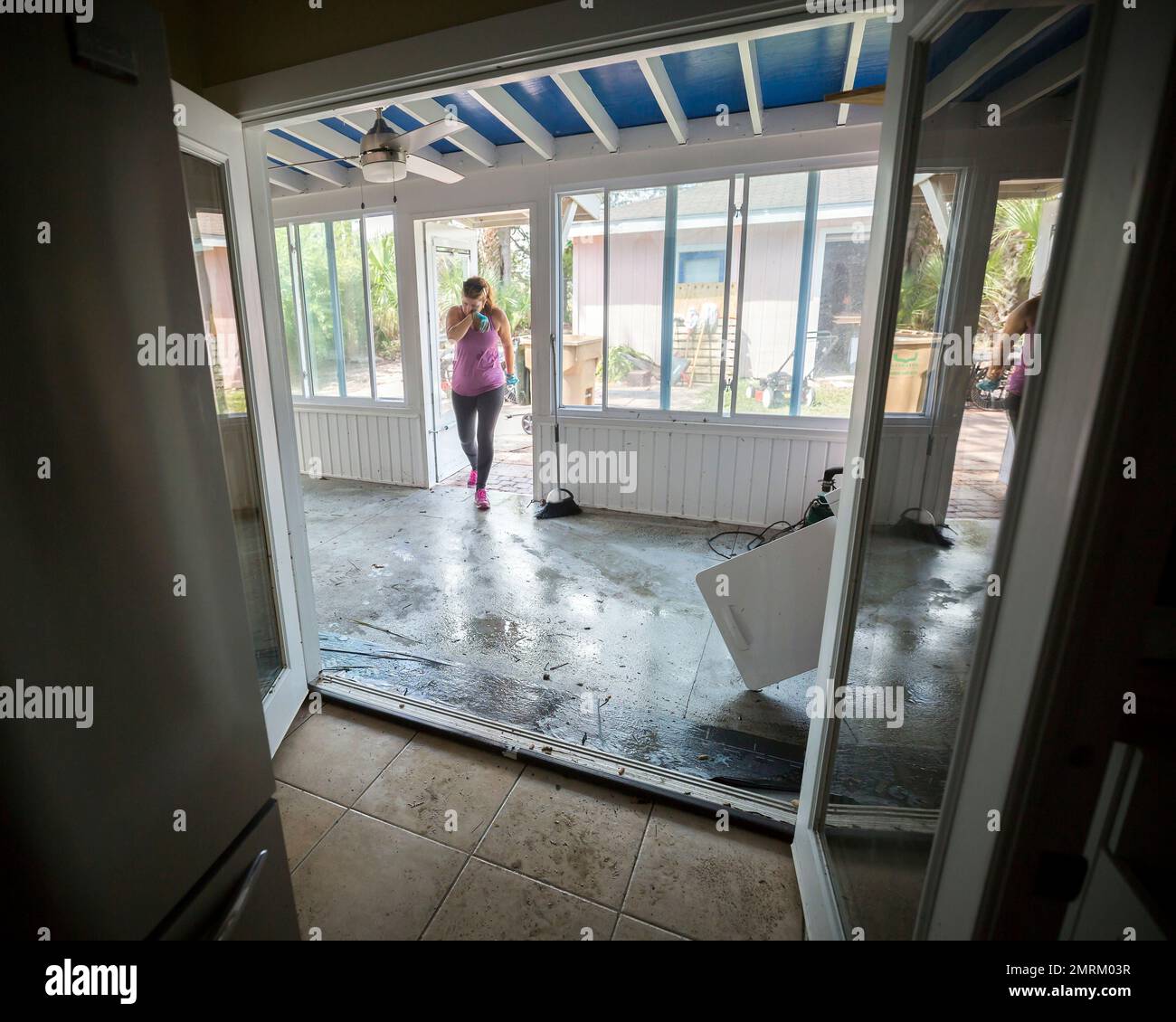 Cheryl Spalding makes multiple trips to the trash to throw out food ...