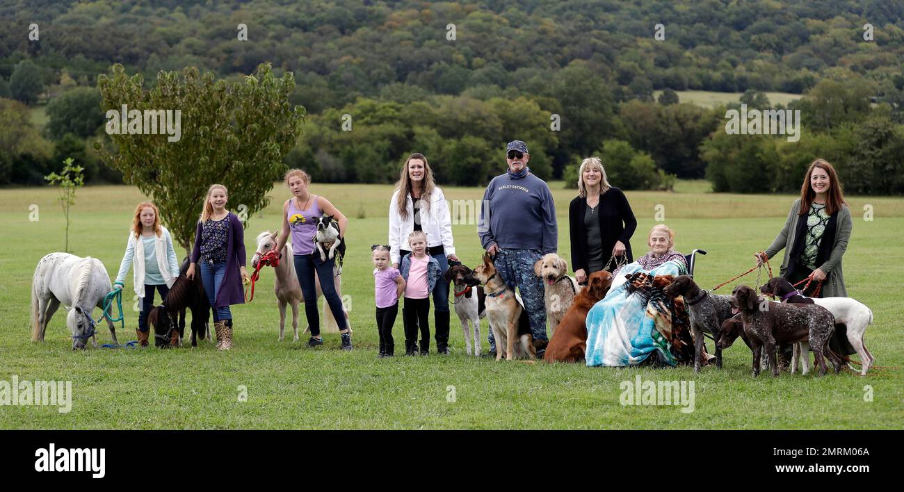Stephanie Clegg Troxell, right, and her family pose at the acreage ...