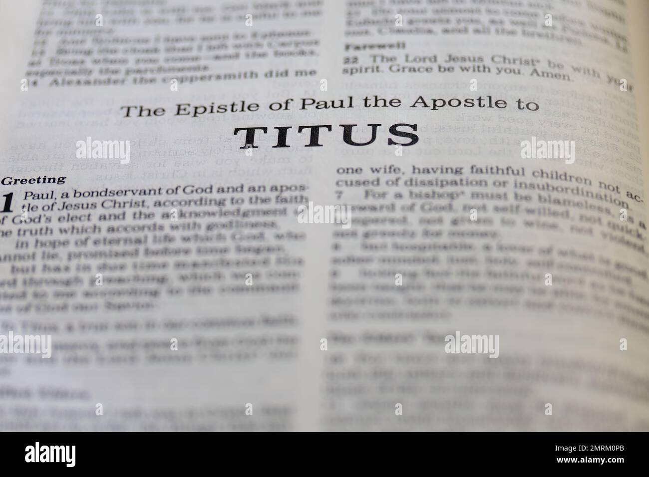 A closeup of "The Epistle of Paul the Apostle to Titus" in Holy Bible ...
