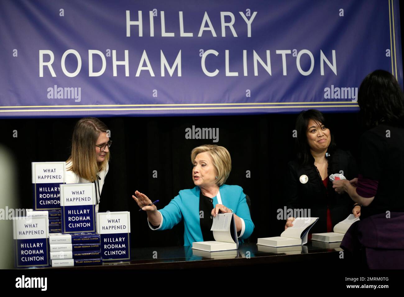 Hillary Rodham Clinton signs copies of her book "What Happened" at a ...