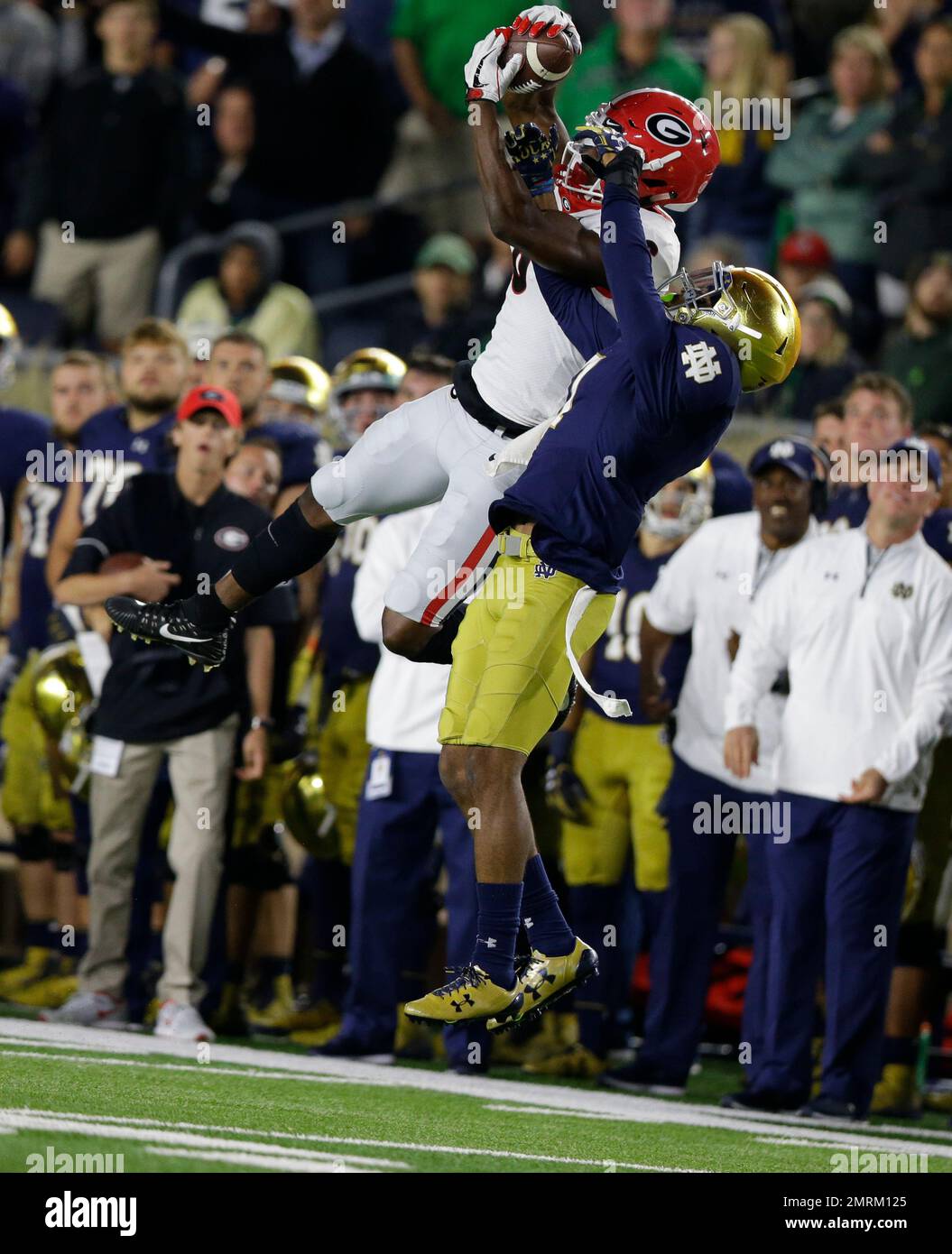 Georgia wide receiver Javon Wims (6) makes a catch over Notre Dame ...