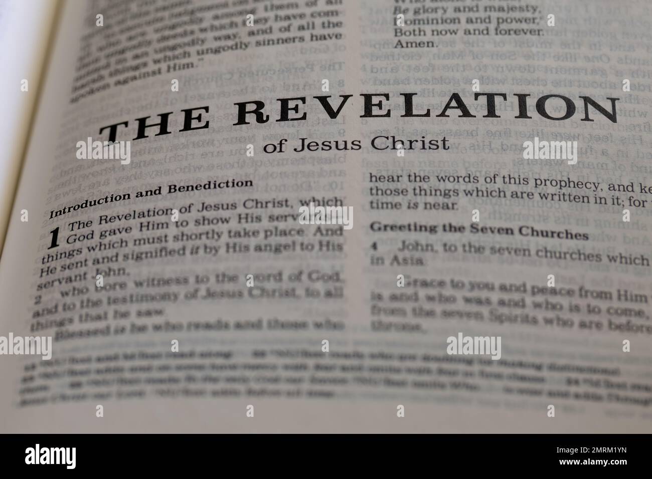 A closeup of "The Revelation of Jesus Christ" in Holy Bible Stock Photo ...