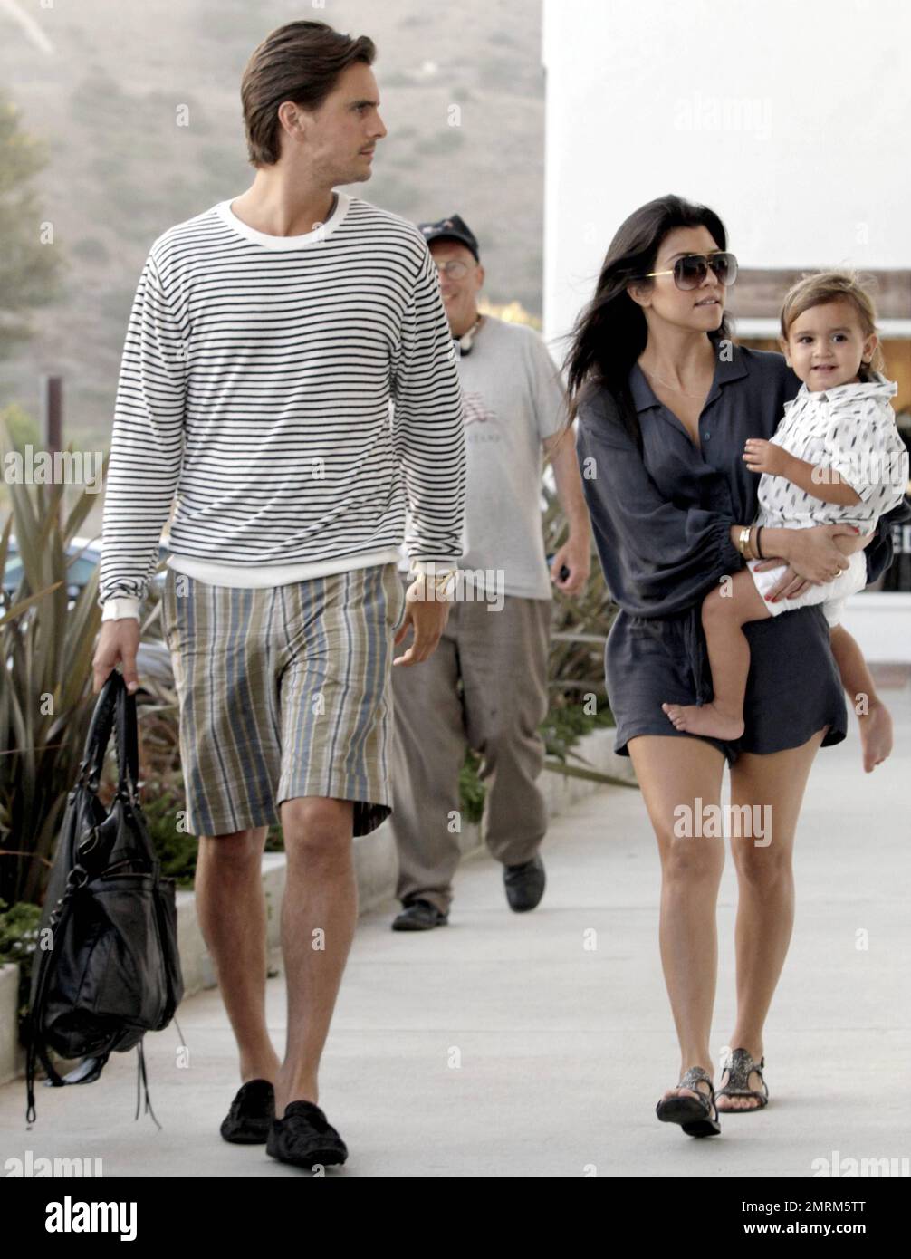 Kourtney Kardashian with partner Scott Disick and their son Mason Dash ...
