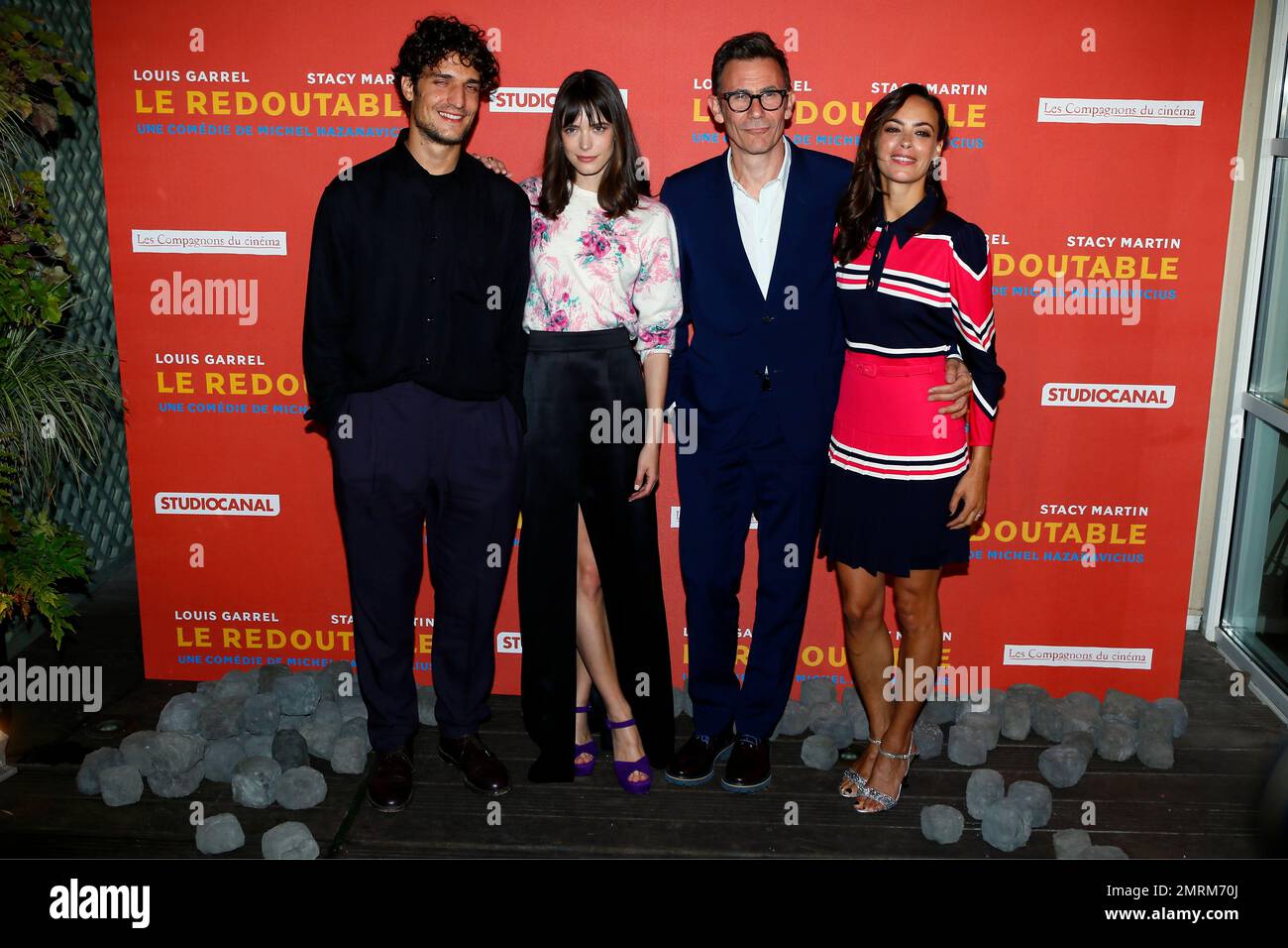 French Director Michel Hazanavicius, second right, poses with actors ...