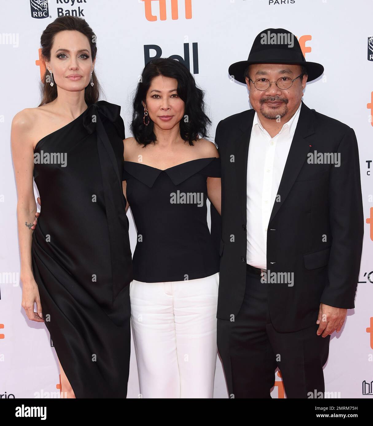Angelina Jolie, from left, Loung Ung and Rithy Panh attend a premiere ...