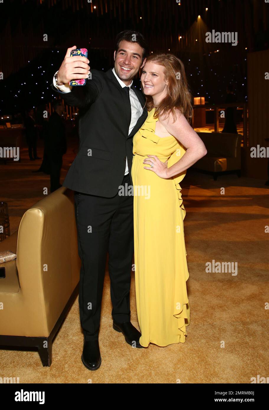 James Wolk, left, and Elizabeth Jae Wolk take a selfie at the Governors ...