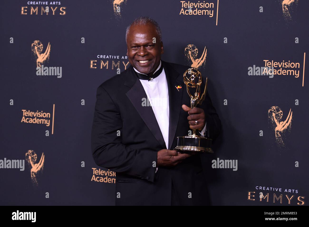 Kim Estes poses in the press room with accepts the award for ...