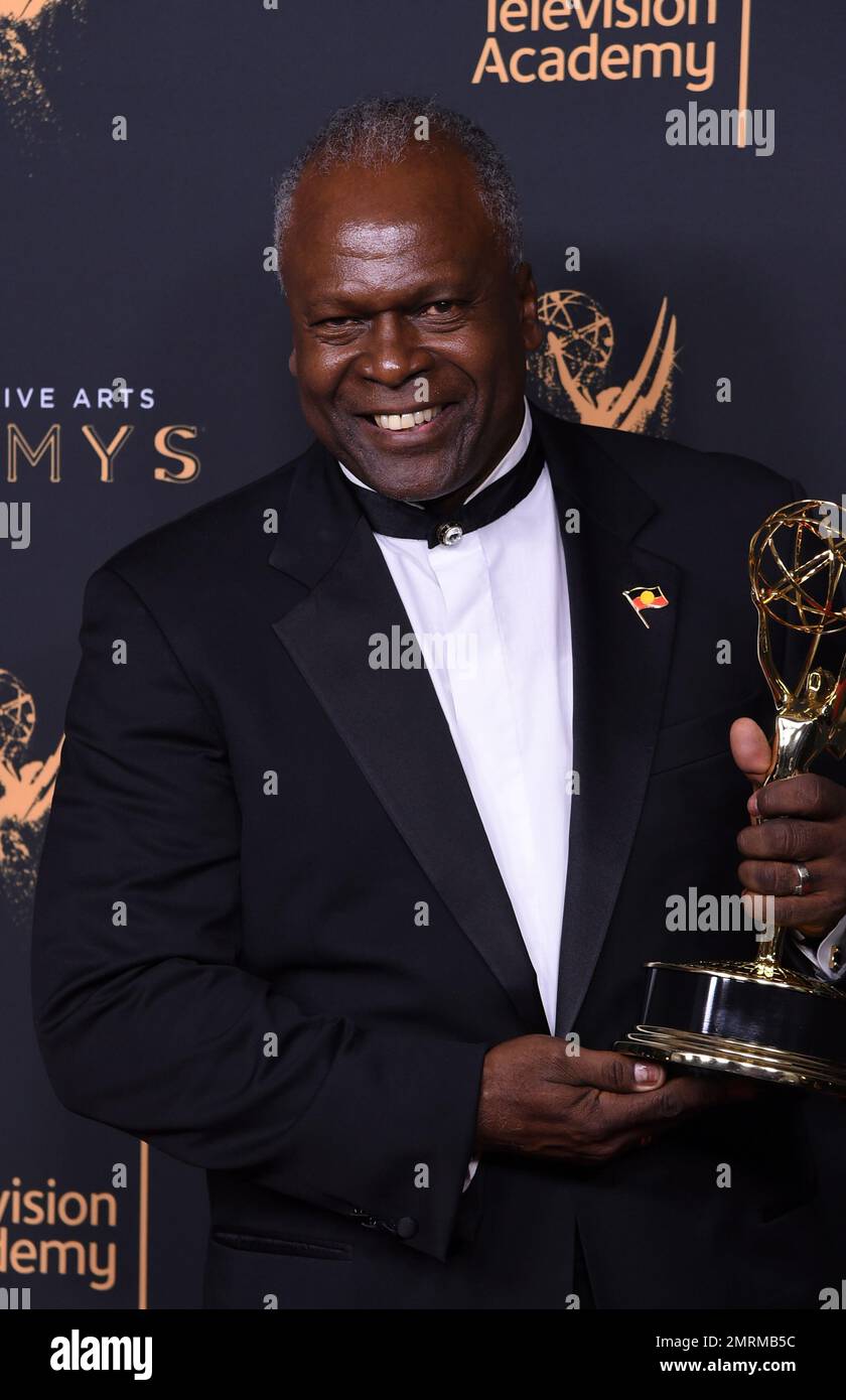 Kim Estes poses in the press room with accepts the award for ...