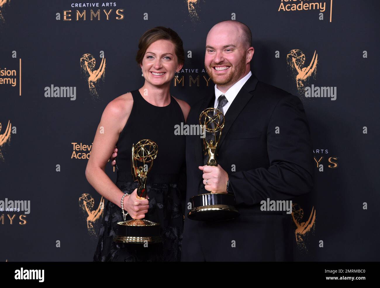 Tara Feldstein Bennett, left, and Chase Paris pose in the press room ...