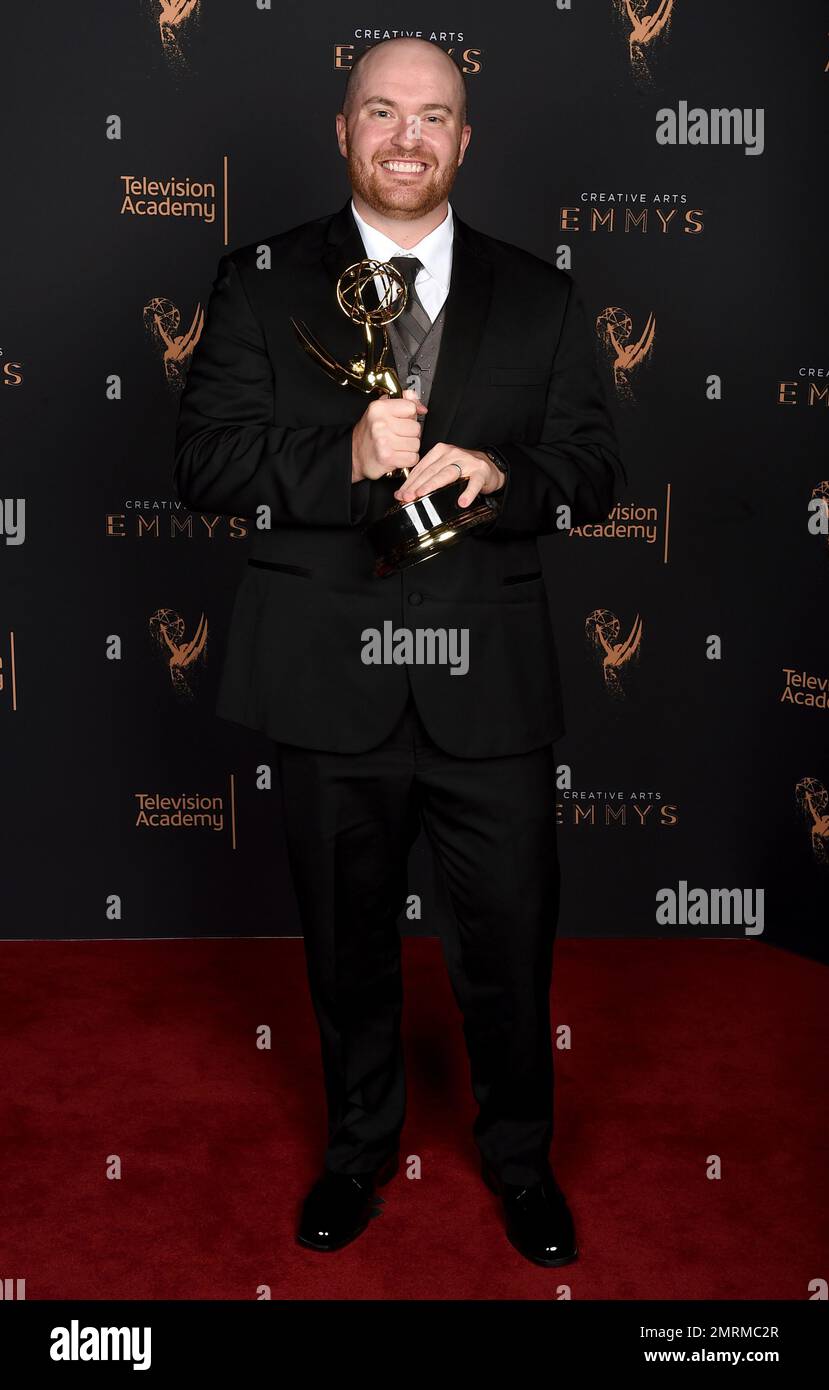 EXCLUSIVE - Chase Paris poses for a portrait with the award for ...