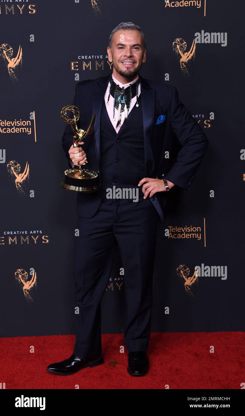 Pavy Olivarez poses in the press room with the award for outstanding ...