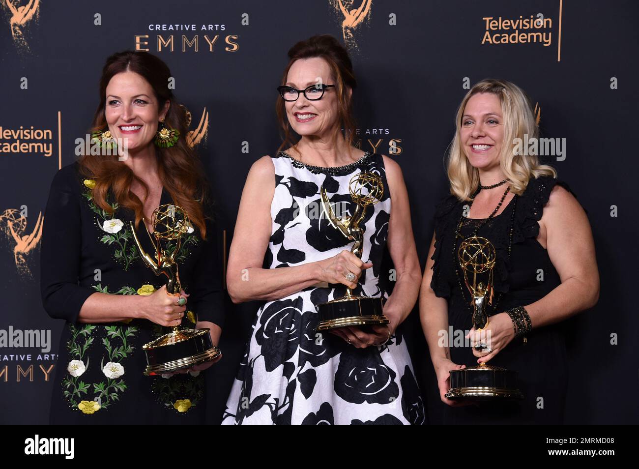 Alex Friedberg, from left, Patricia McLaughlin and Risa Garcia pose in ...