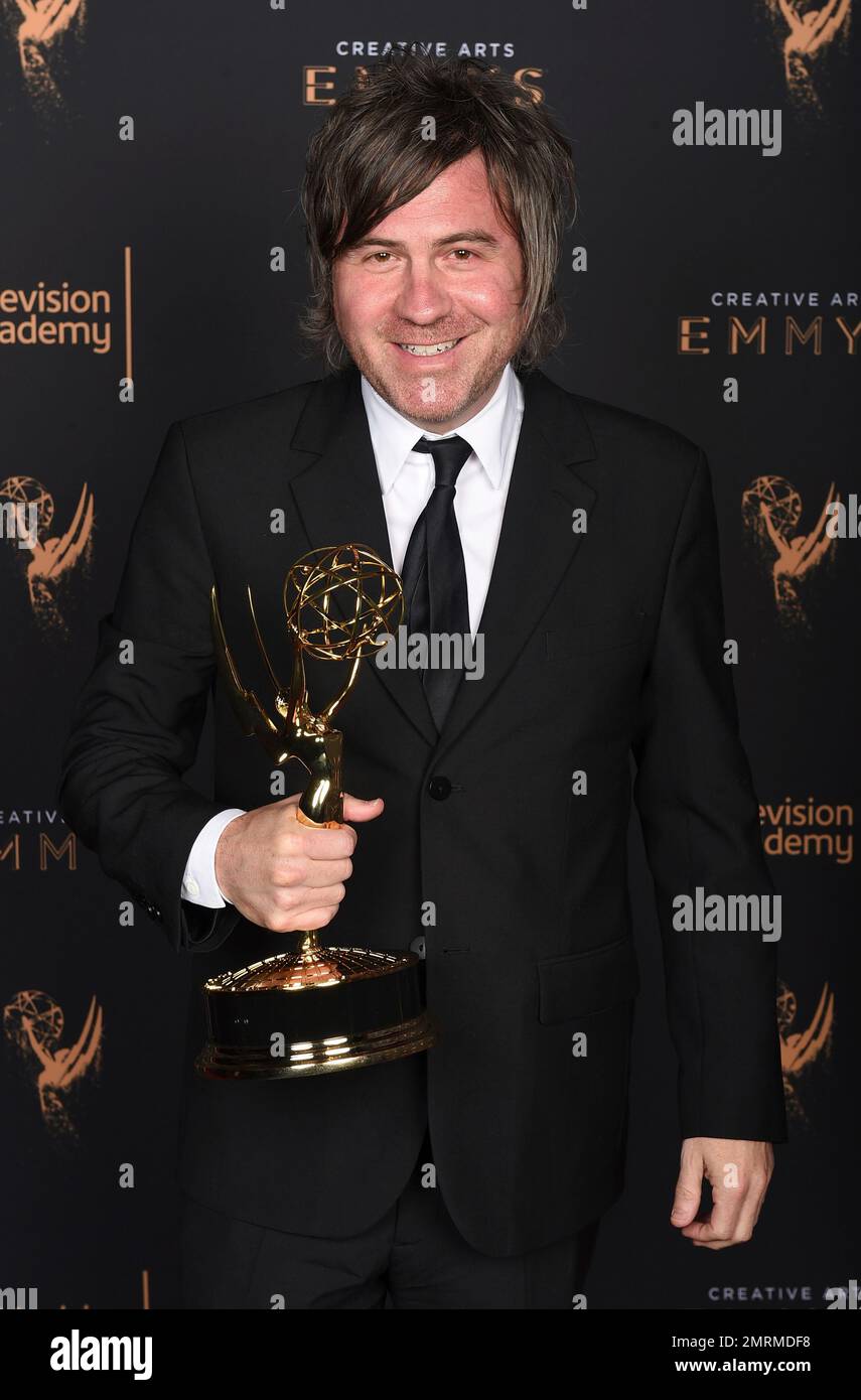 EXCLUSIVE - David Klotz poses for a portrait with the award for ...