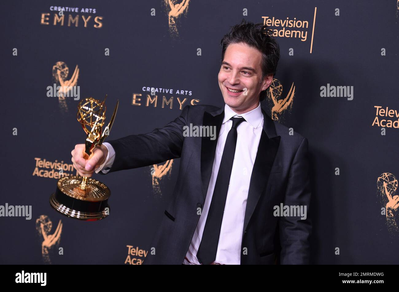 Jeff Russo poses in the press room with the award for outstanding music ...