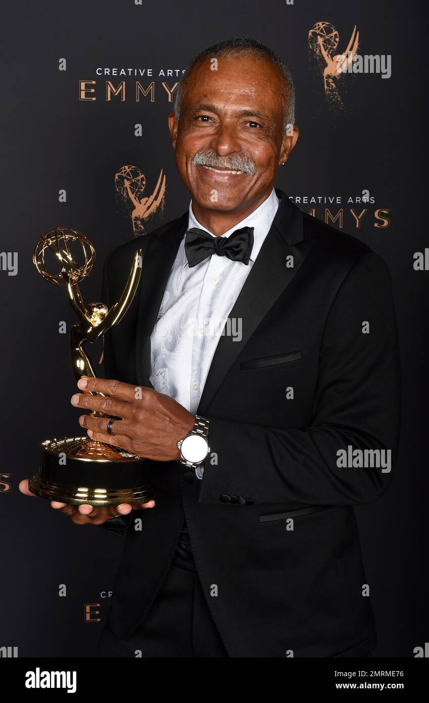 EXCLUSIVE - Donald A. Morgan poses for a portrait with the award for ...