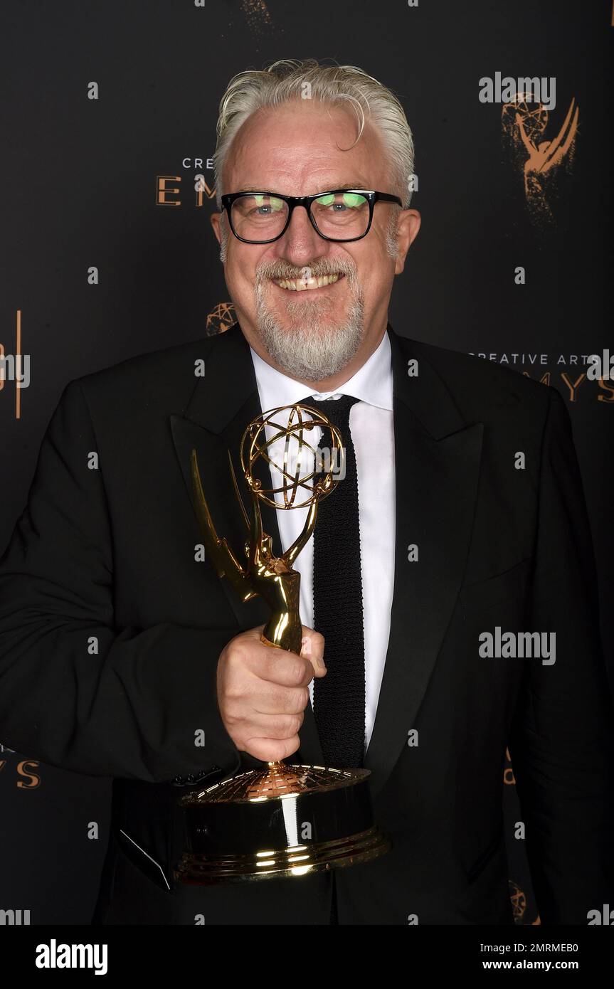 EXCLUSIVE - Martin Childs poses for a portrait with the award for ...