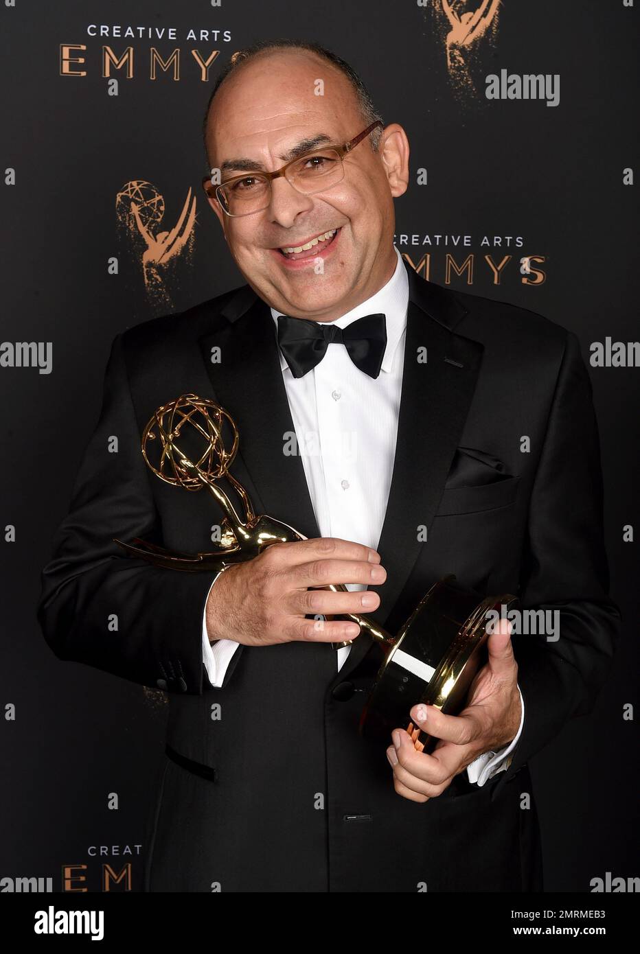 EXCLUSIVE - Peter Chakos poses for a portrait with the award for ...